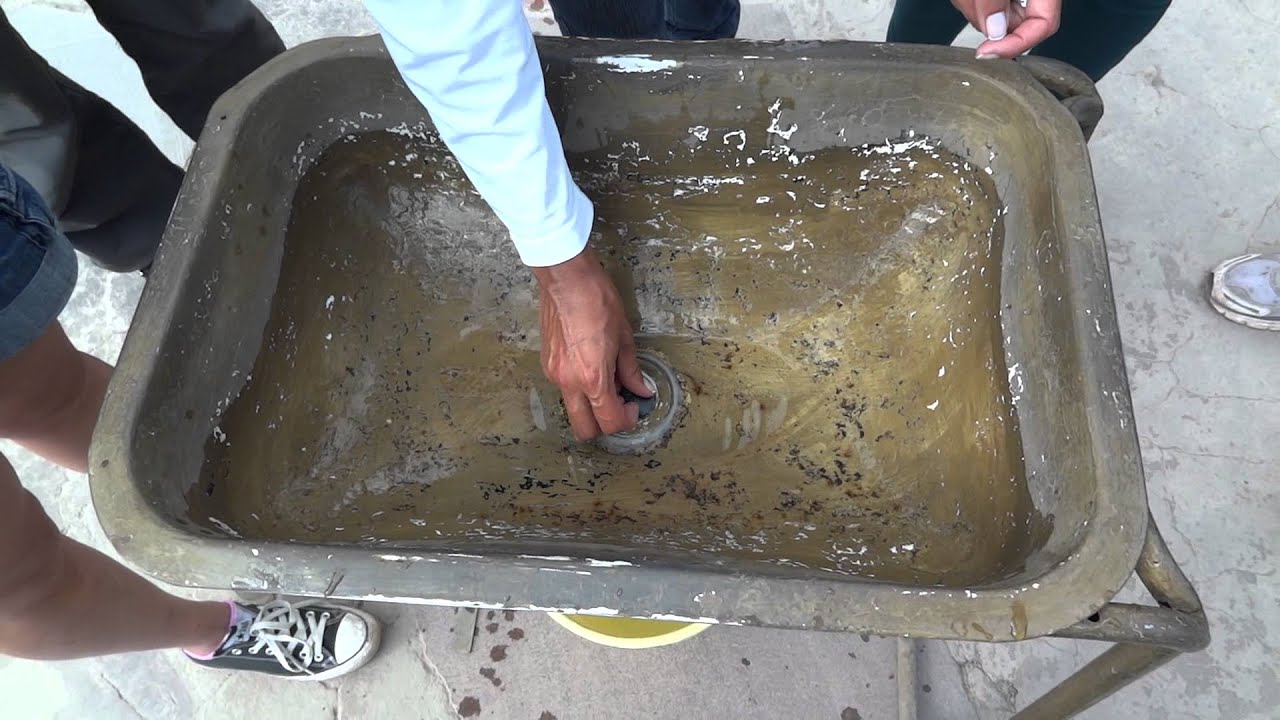 Water, a sink and the equator. the coriolis effect - YouTube