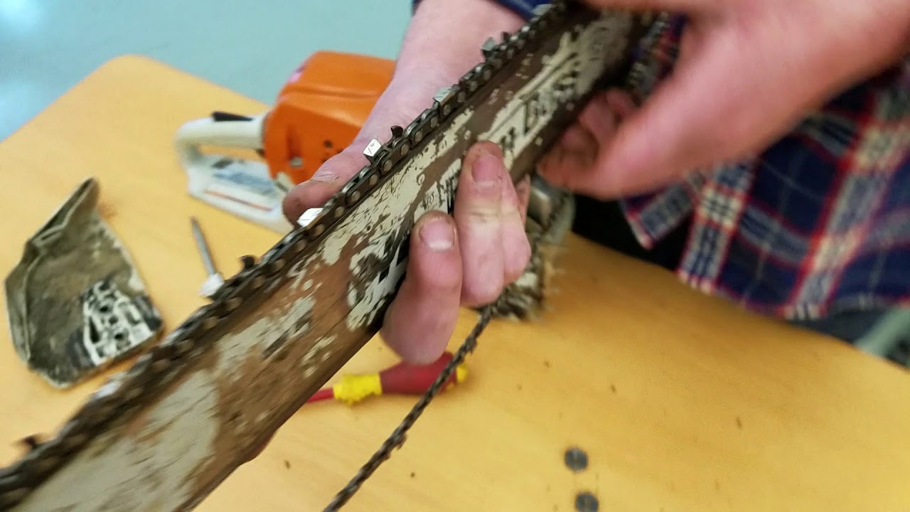 How to Replace a Bar and Chain on a Chainsaw - YouTube