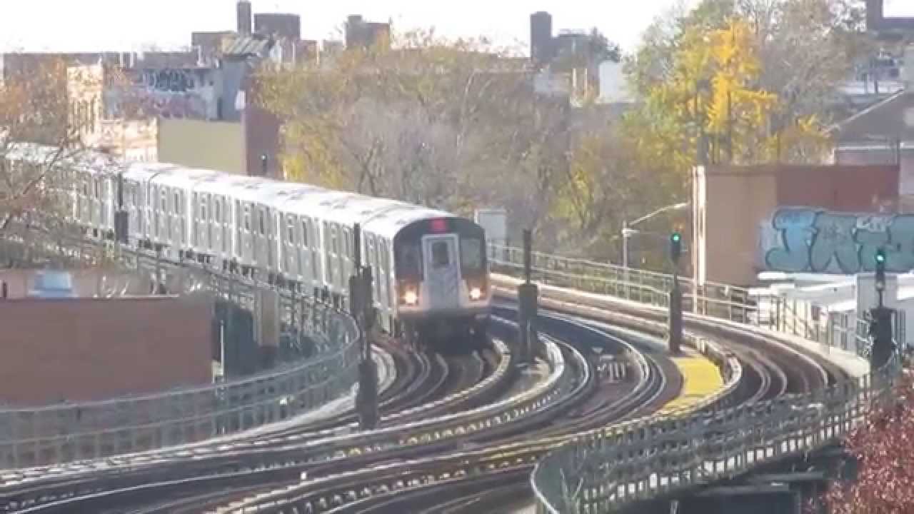 R188 (7) Train (In Service) at Woodside - 61st Street - YouTube