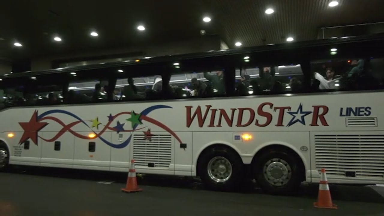 More migrant buses arrive in NYC as executive order takes effect - YouTube