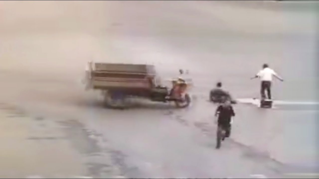 Three wheeler does donuts and runs over rider after crash - YouTube