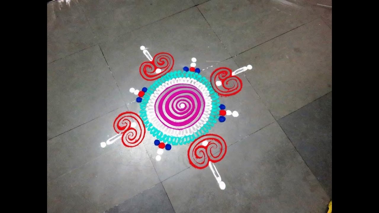 how to make simple rangoli design created by latest rangoli - YouTube