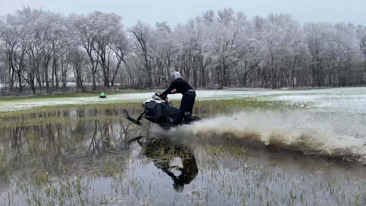 Snowmobiles, snow, mud, water, spring? - YouTube