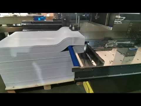 GW rear feeding loader and retractable side lay system - YouTube