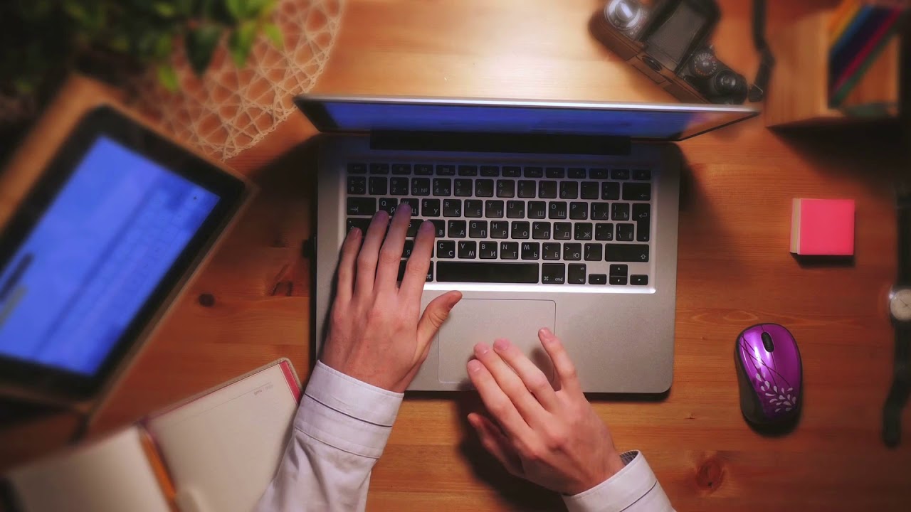 HD footage: Typing on laptop - aerial view - YouTube