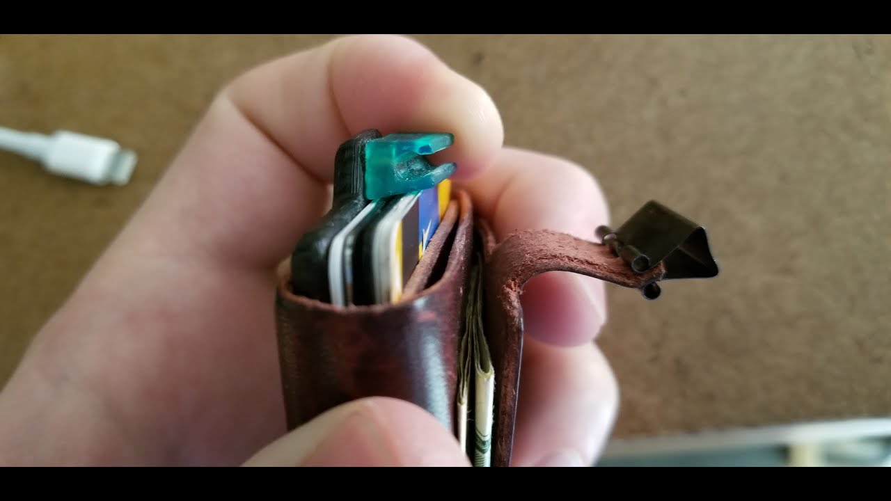 Watch the evolution of a Minimalist Magnetic Clasp Fidget wallet - YouTube