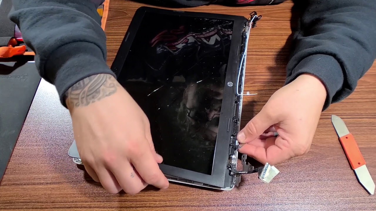 Removing damaged display from assembly - YouTube