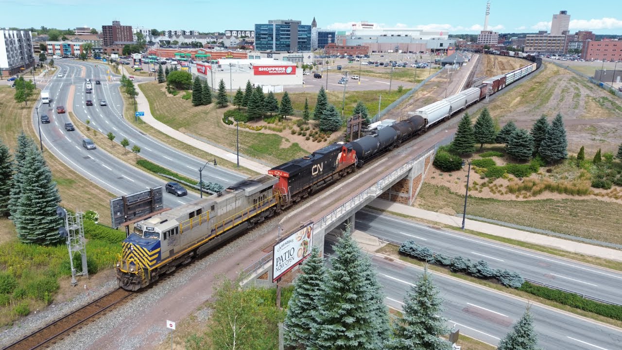 Awesome Aerial 4K View w/zoom! Decent Size Freight Train CN 507 passing ...
