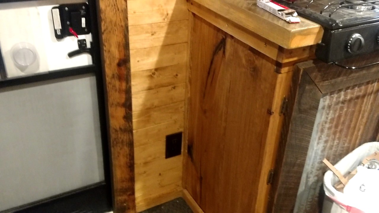 Finished trim in custom Glacier fish house. - YouTube