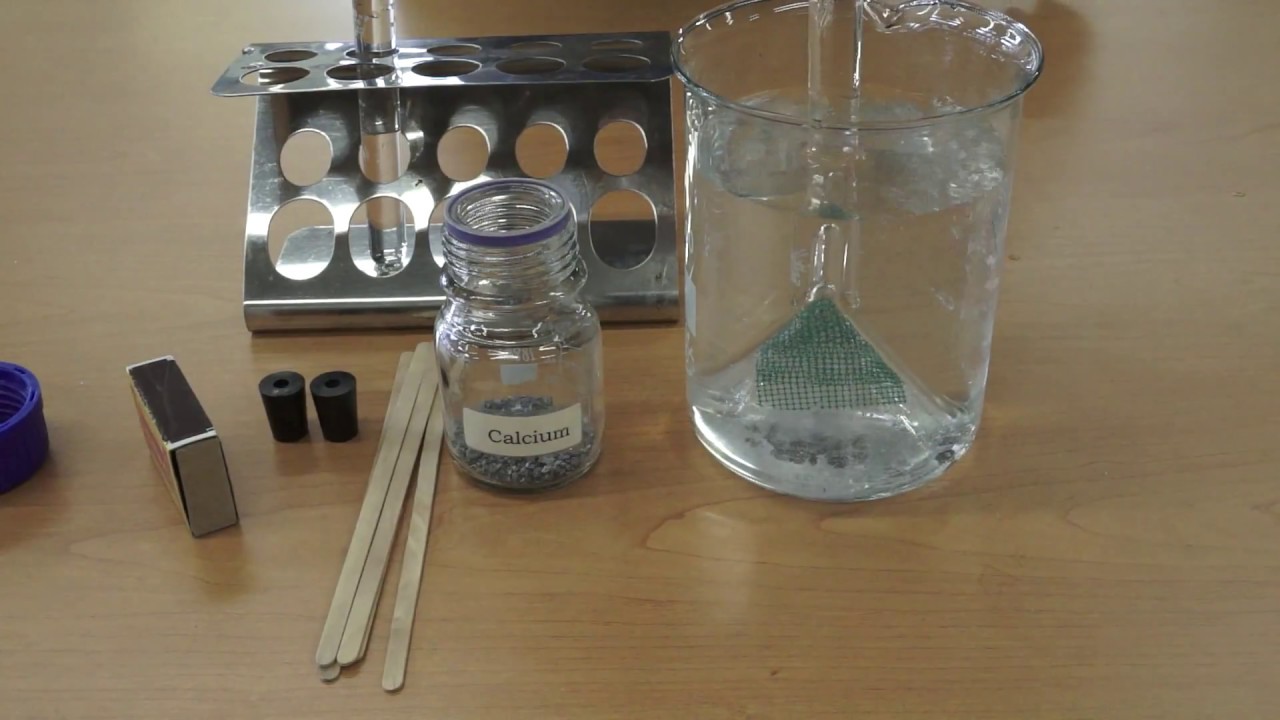 Production of hydrogen Calcium in water - YouTube