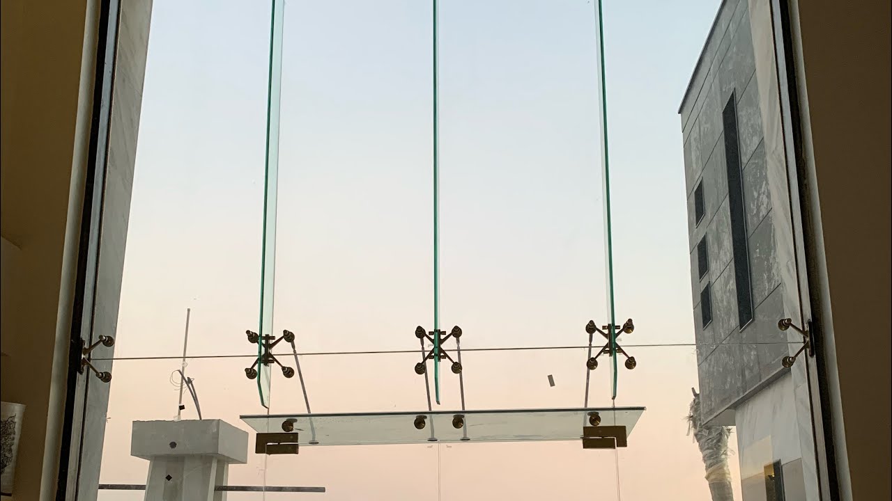 With fin spider laminated glass with glass Canopy - YouTube