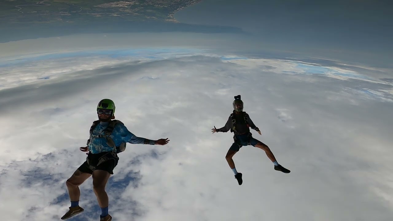 Duo Jumps Through Scenic Clouds While Skydiving - 1358542 - YouTube