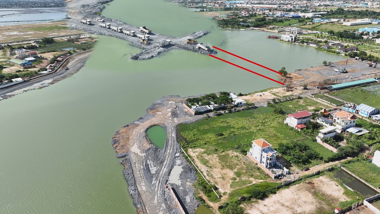 Construction Action Showing SHACMAN Truck Unloading Big Dozer Shantui in sand - YouTube