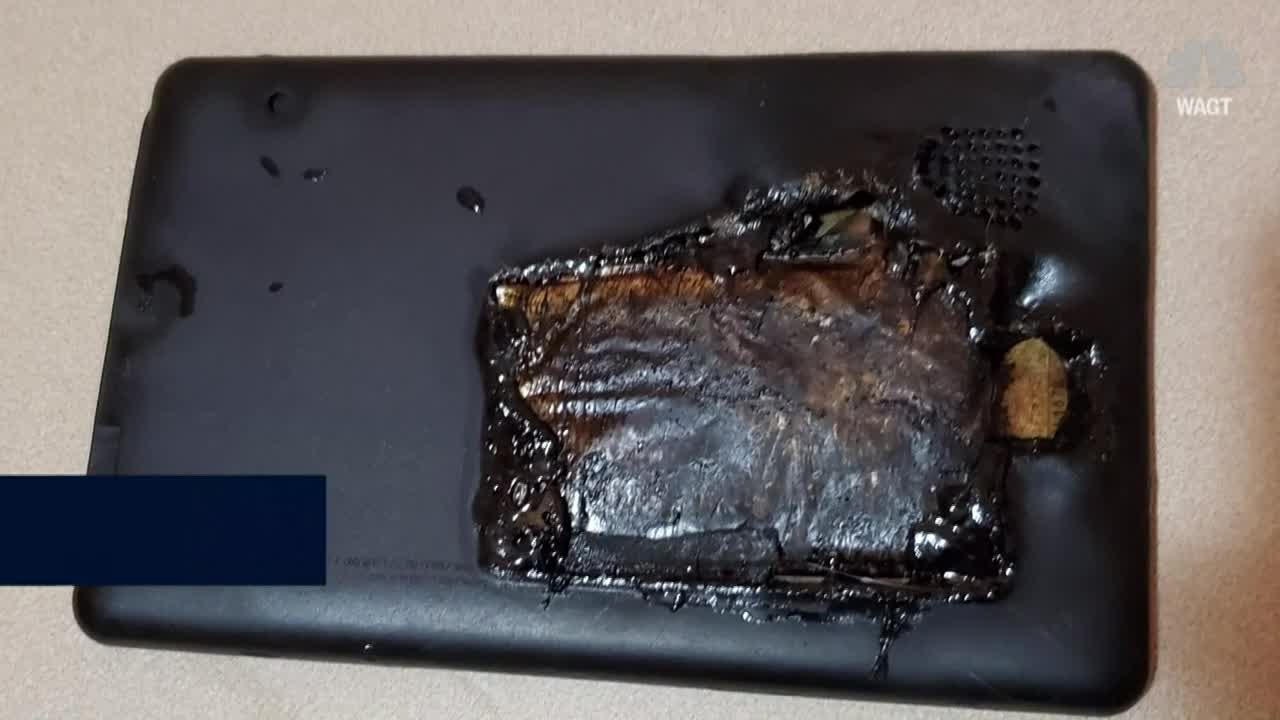 Tablet catches fire in child's hands - YouTube