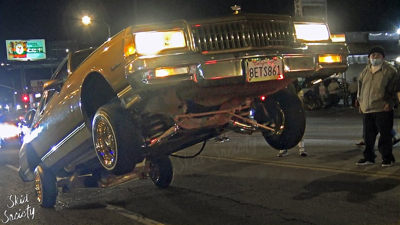 Lowriders BLOCK OFF Whittier Blvd by Hopping Cars - YouTube
