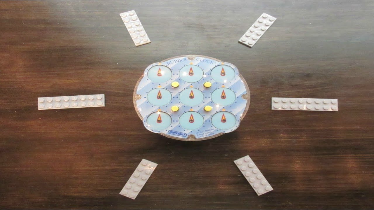 How To Solve The Rubix Rubik's Clock - YouTube