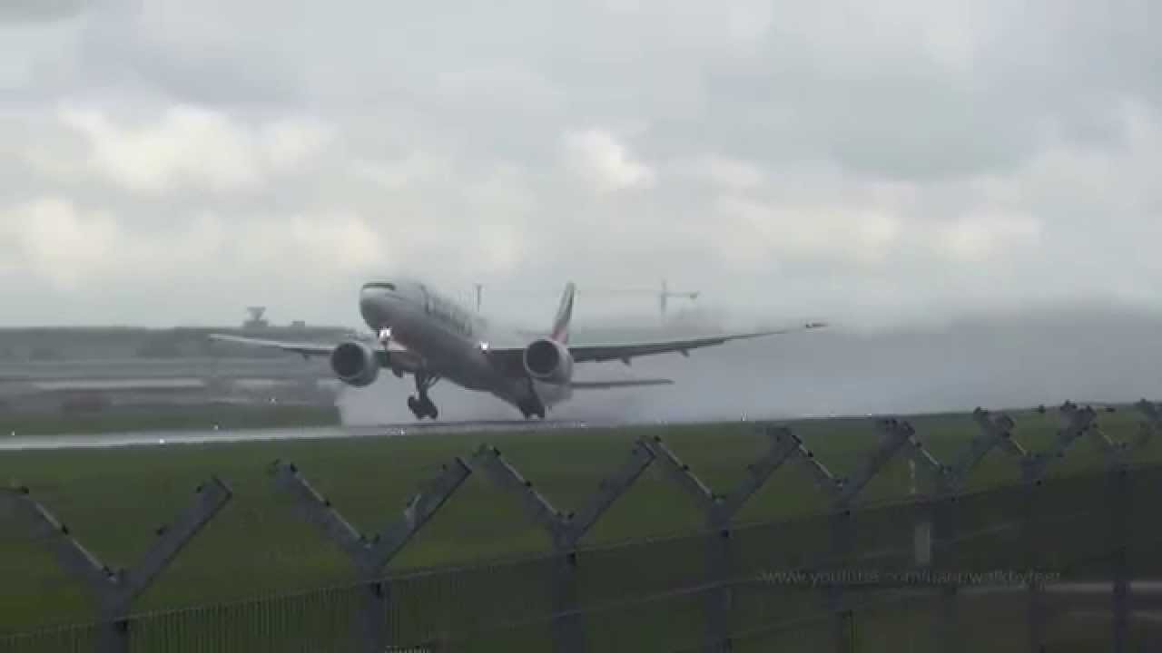 Extreme wet runway takeoff of Emirates 777 at Hamburg Airport - YouTube