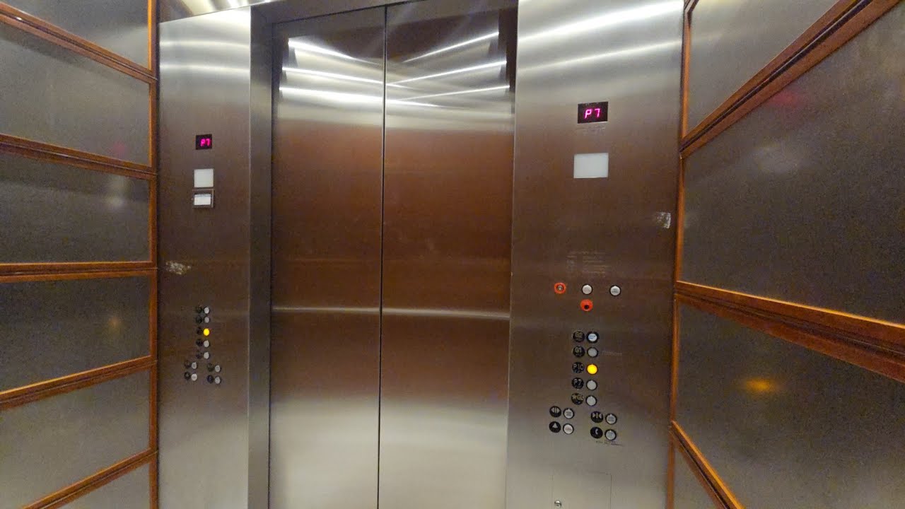 Neat MontgomeryKone Traction Express Elevators - YouTube