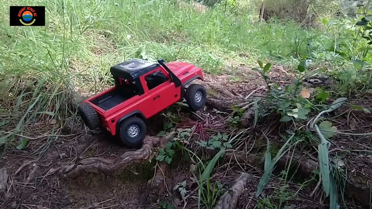 Off-Road Adventure: MN 90 D90 Land Rover Defender Conquers Obstacles in ...