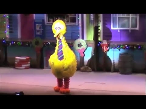 Big Bird falls while singing a Christmas song - YouTube