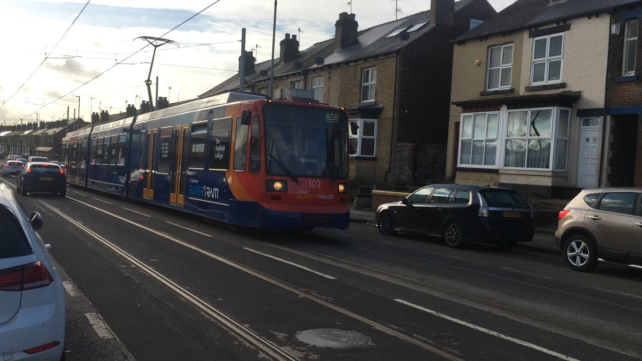 Sheffield Supertram 102 heads up Middlewood Road with Yellow Route ...