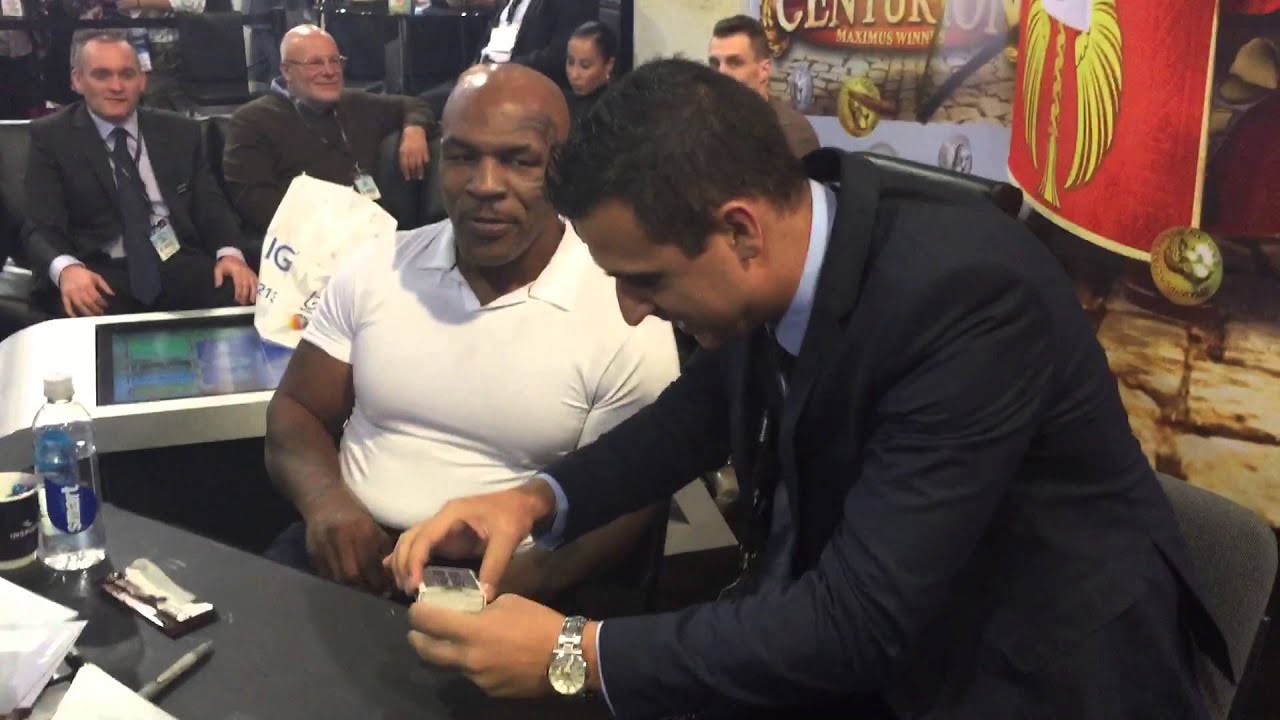 Mike Tyson left smiling after magic trick - YouTube