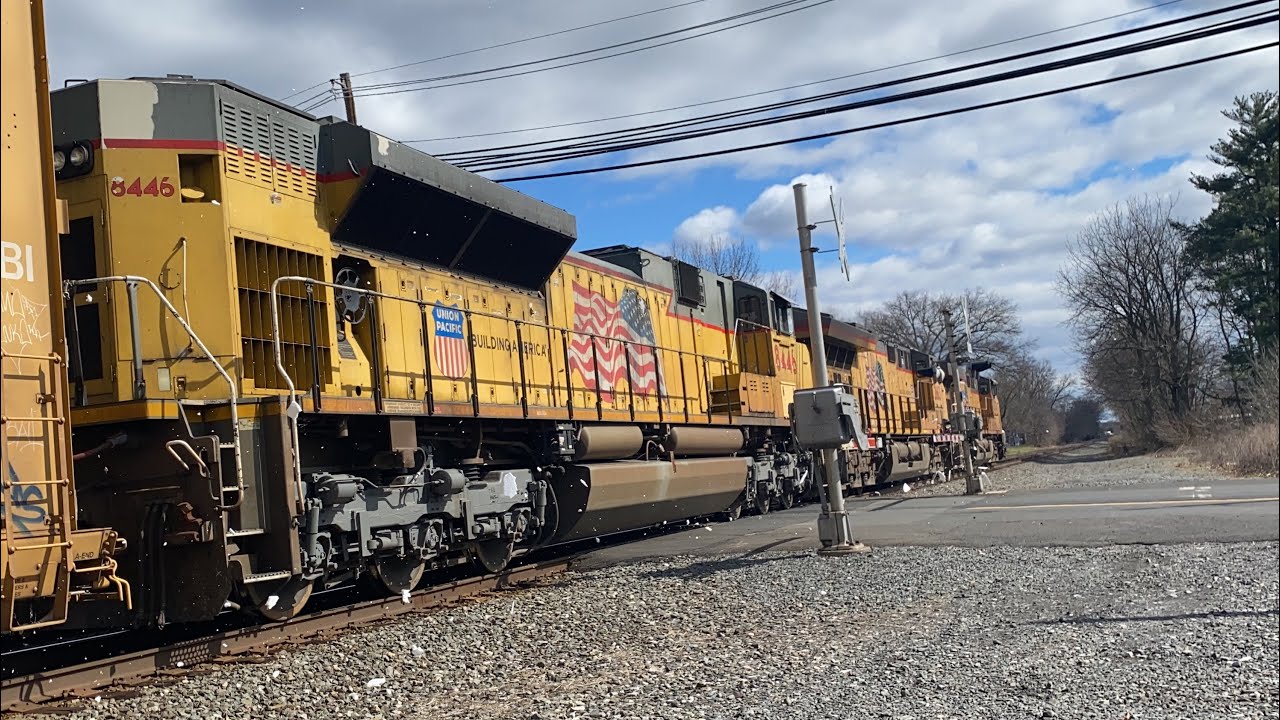 UP 5378 with two more UPs leads NS 212/24X hitting at trash bag full of styrofoam! 3/27/2022 ...