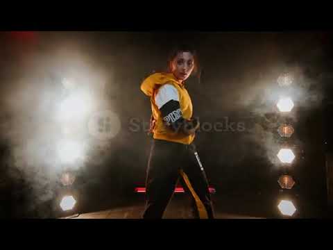 Young Brunette Dancing Break Dance In Studio  Flashing Light  Room Is Filled With Smoke  Stock Video