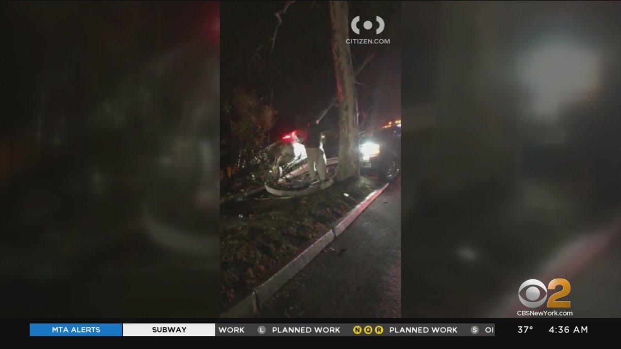 Collision Leaves Car Dangling Off Ledge - YouTube