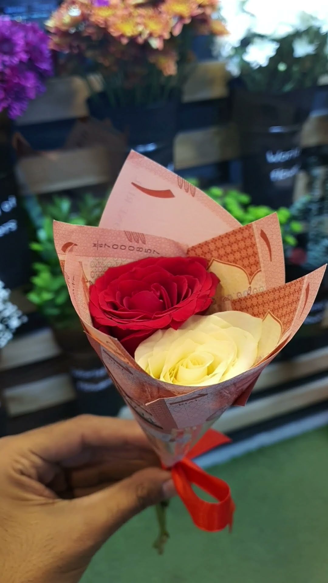 Two roses wrapped in Omani Rials #shorts #viral #flowers #foryou #video ...