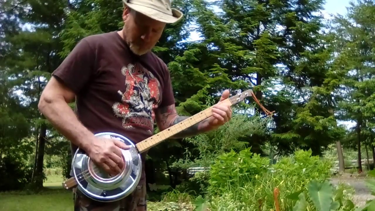 3 String Hubcap Guitar - YouTube