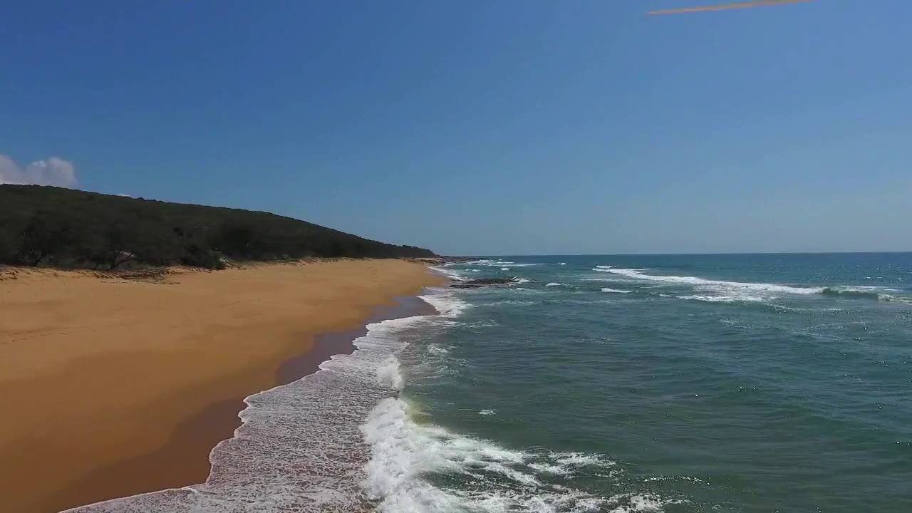 Red Rock Beach - YouTube
