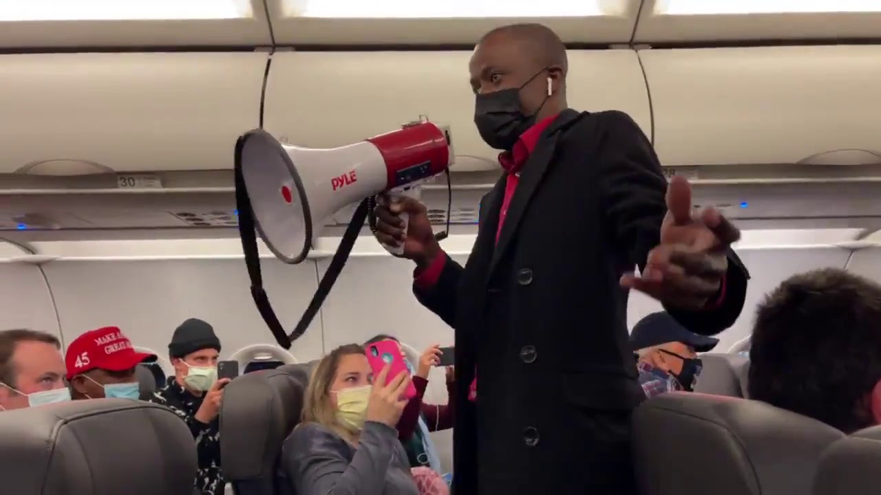 Errol Webber, CA Governor candidate, leads "God Bless America" on plane ...