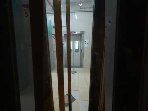 HDB Lift race between an EM and IFE elevator at Block 5 Banda Street ...