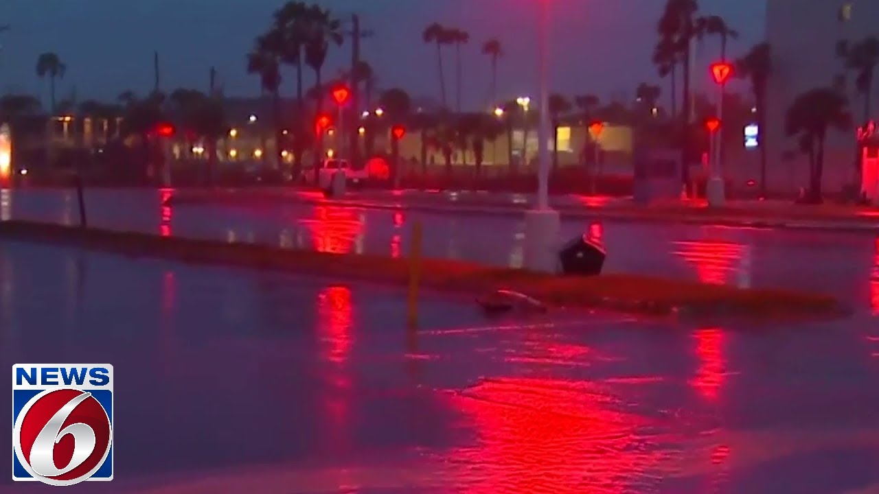 Storm system brings rough surf, flood threat along Florida coast - YouTube