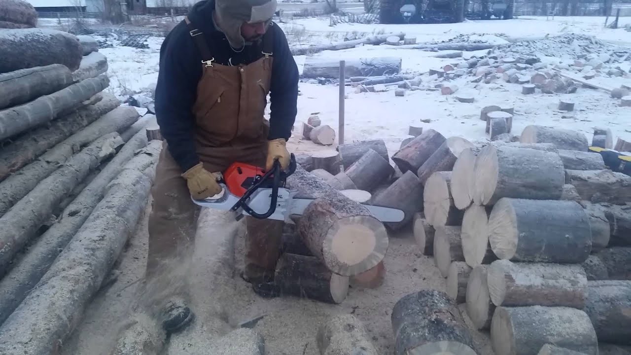 Stihl cutting 20' foot log in under two minutes - YouTube