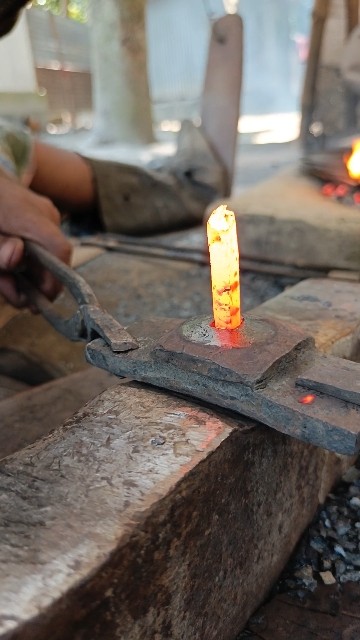 Red-hot iron shaped into a flawless nail in seconds—pure blacksmith ...