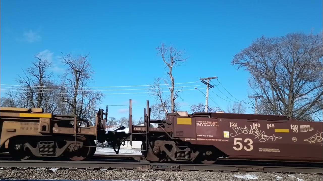 BNSF 6221 leads a long Baretable with a Rear End DPU - YouTube