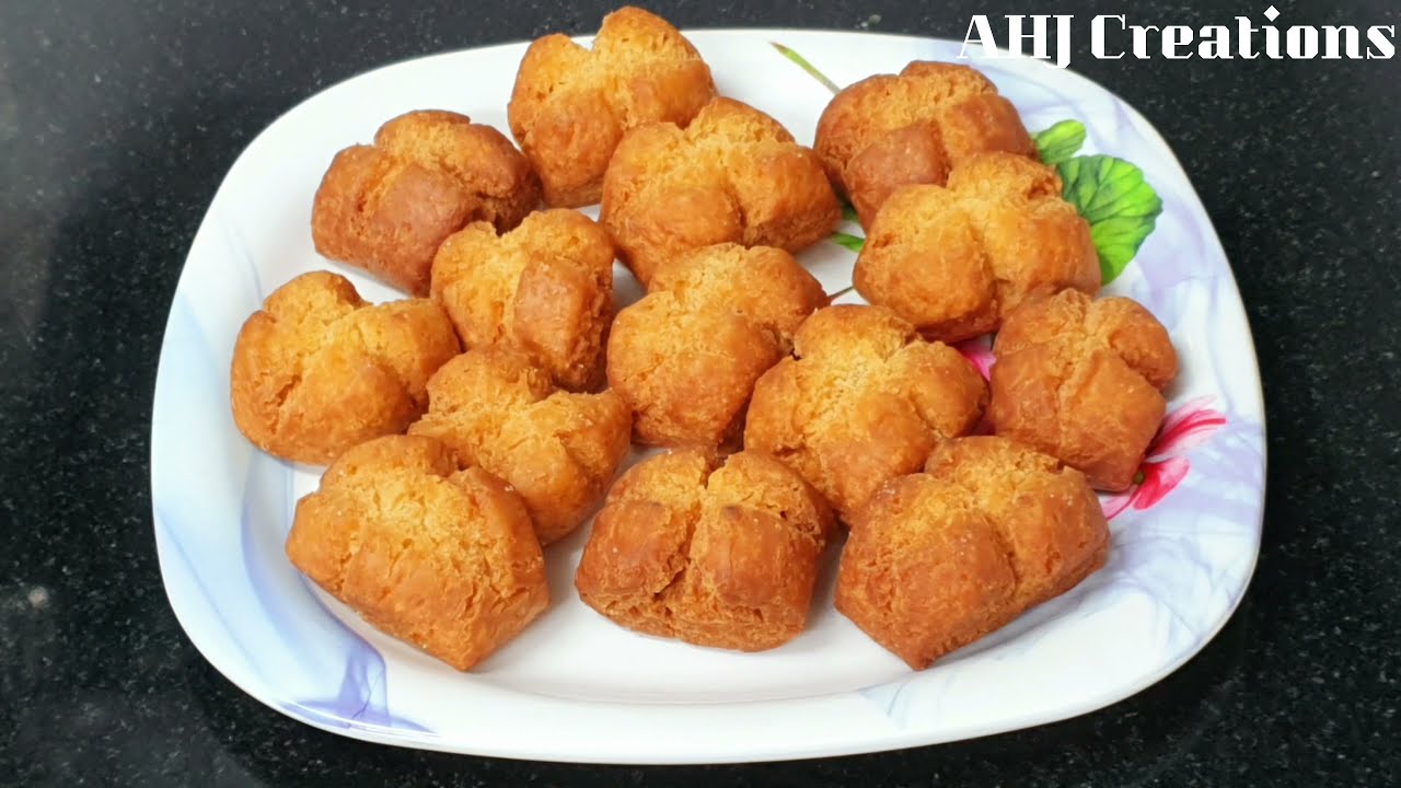 നാടൻ തട്ടുകട സ്റ്റൈൽ വെട്ടു കേക്ക് || Vettu Cake || Mutta Cake || AHJ ...