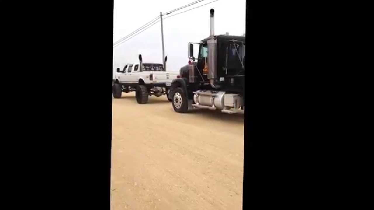 Powerstroke pulling loaded semi - YouTube