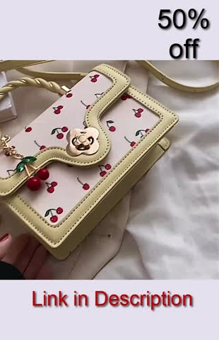 This Is a Red Handbag with a Cute Cherry Design for Dating and Shopping ...