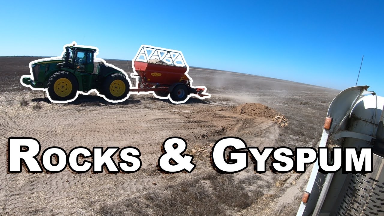 Spreading gypsum and picking up rocks - YouTube