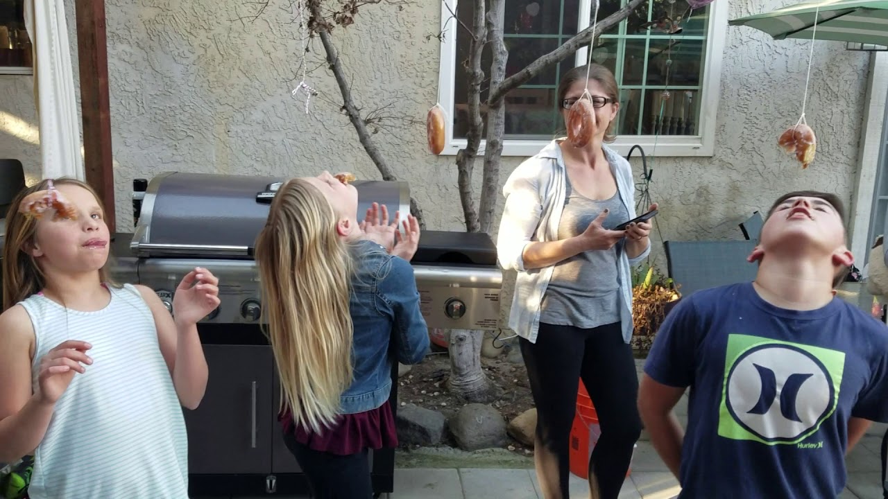 Donut eating contest - YouTube