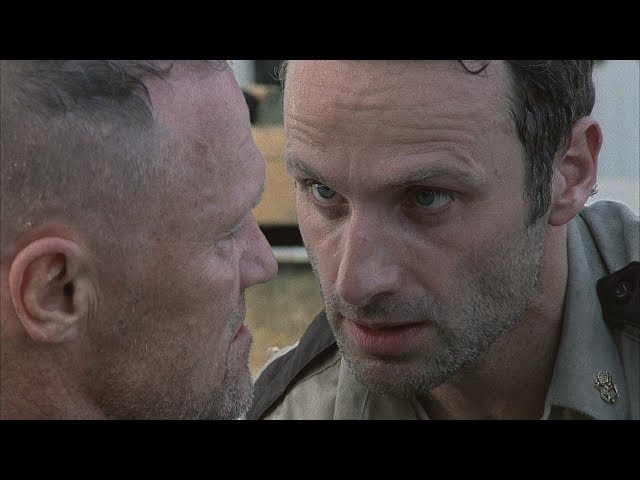 Merle Dixon Handcuffed