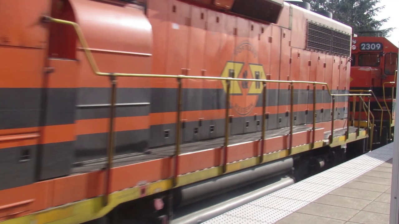 PNWR's 663 passes the Tigard Transit Center WES Station in Tigard ...