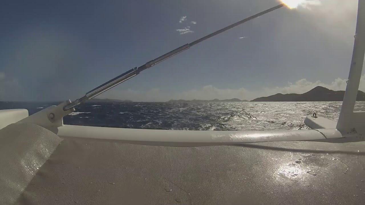 On the Bow of a 60 foot Catamaran in Heavy Seas. British Virgin Islands ...