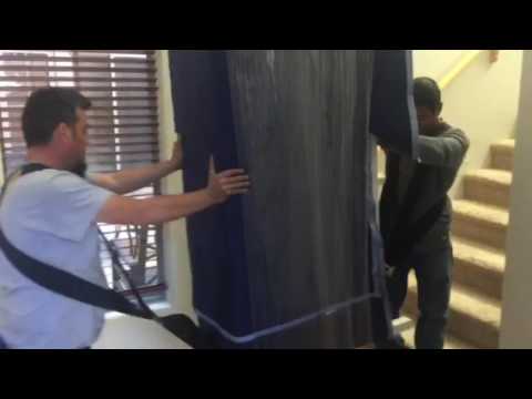 How to move a dresser up a flight of stairs - YouTube