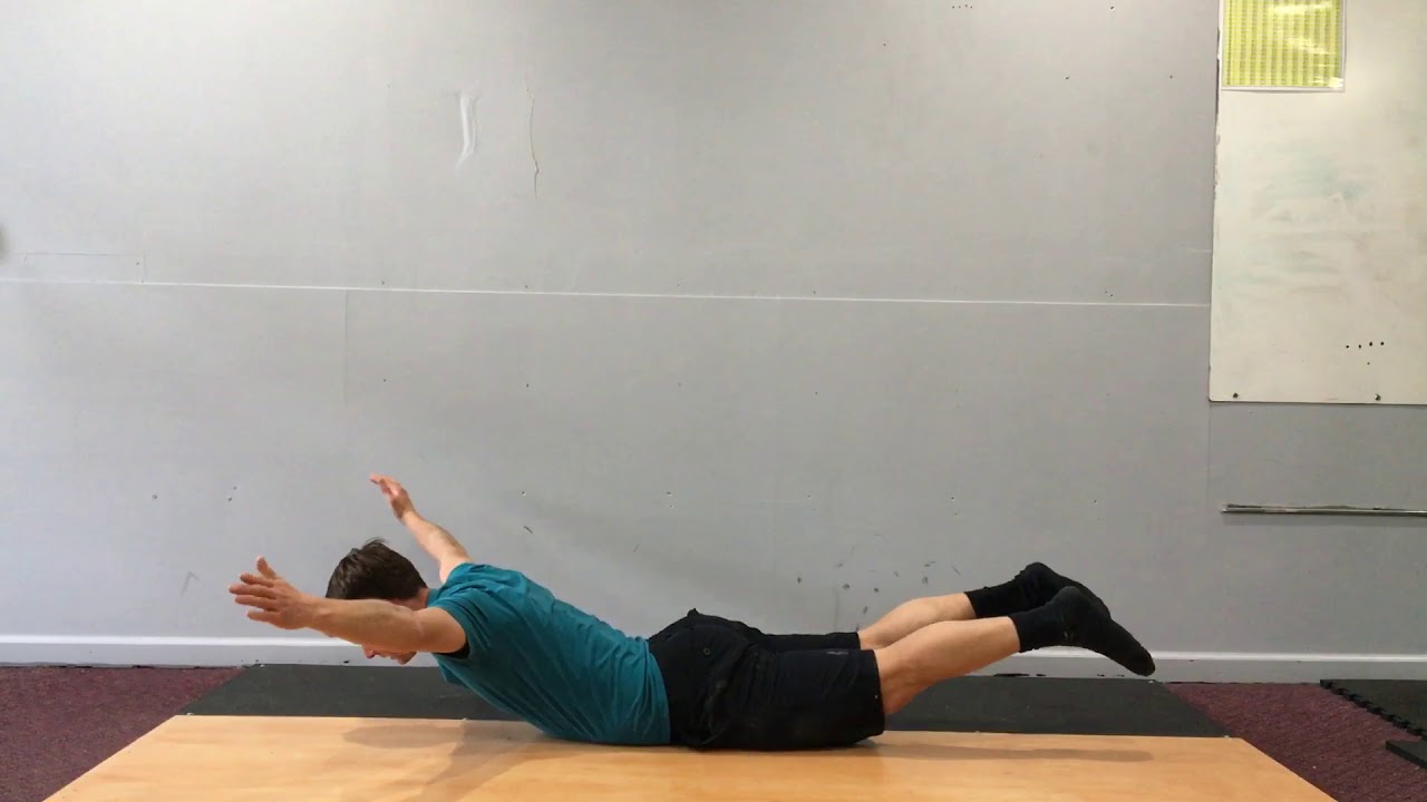 Prone Arch Hold Arms Overhead - YouTube