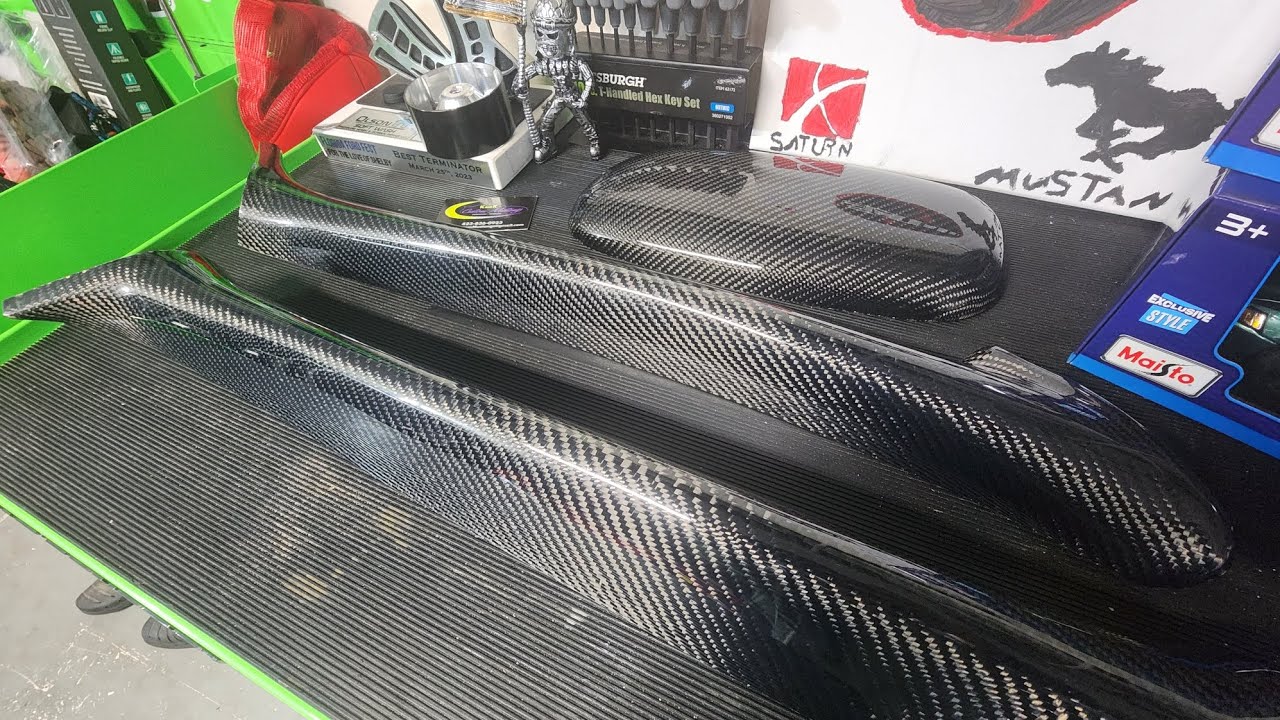 Getting the Carbon pillars installed on the factory pillars. Super easy ...