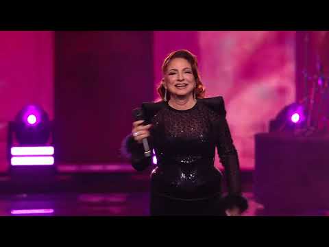 Gloria Estefan - “Rhythm Is Gonna Get You,” \
